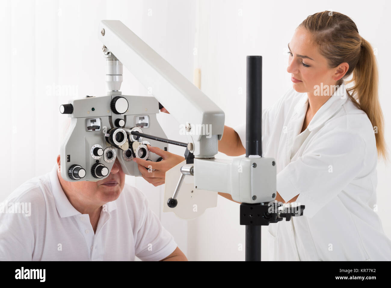 An Optometrist Doing Sight Testing For Patient Stock Photo - Alamy