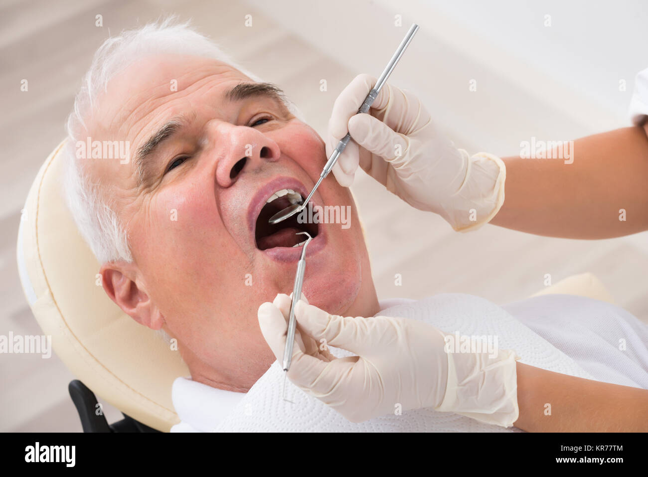Man Undergoing Dental Treatment Stock Photo - Alamy