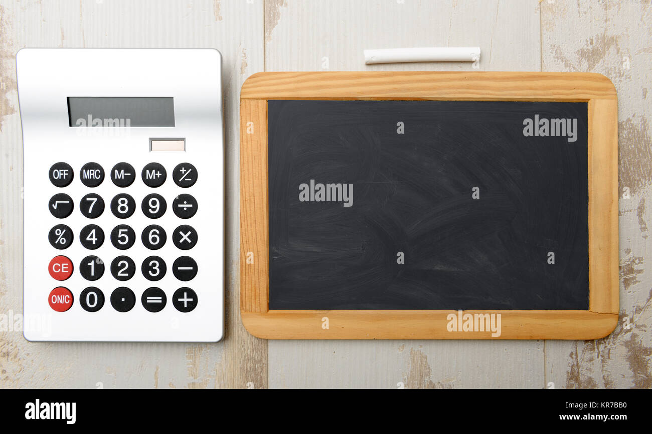 chalkboard and calculator Stock Photo - Alamy