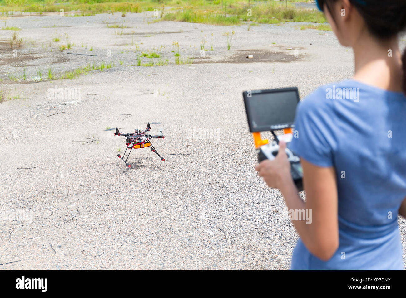 Woman control the drone Stock Photo - Alamy