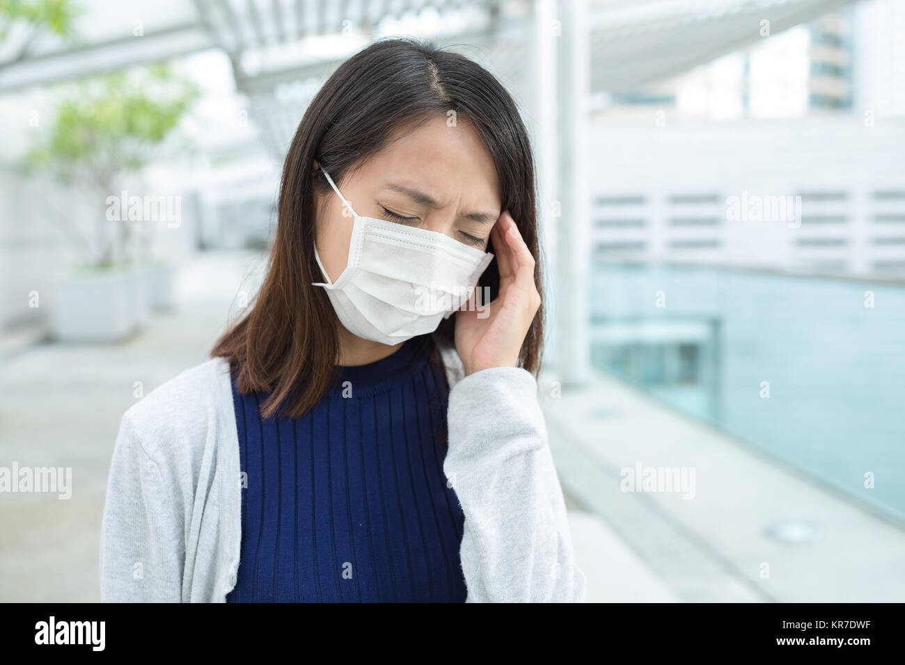 Woman feeling unwell Stock Photo - Alamy