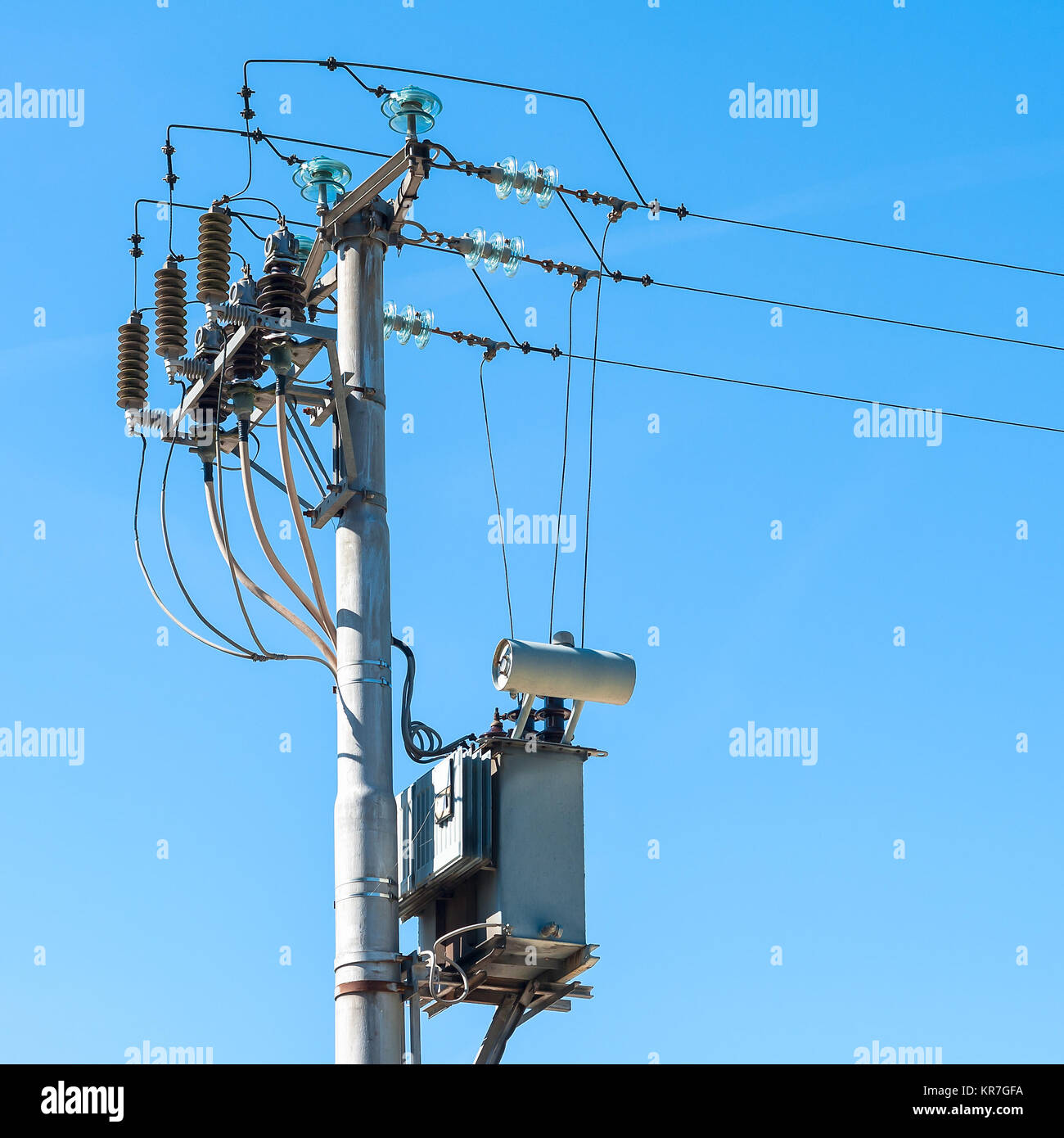 Electrical transformer to electrical pylon against the blue sky Stock ...