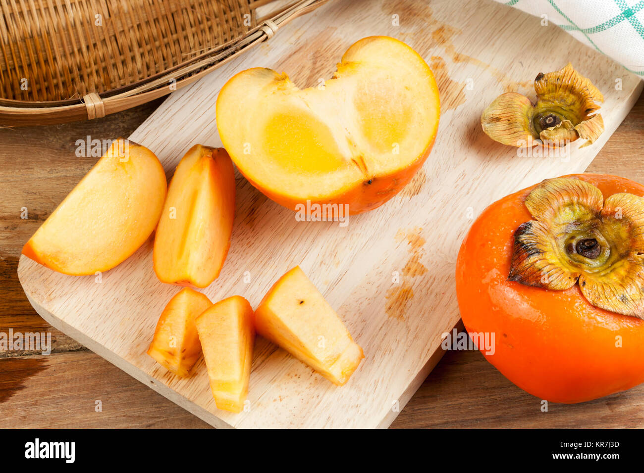 Persimmon yellow color fruits Stock Photo - Alamy
