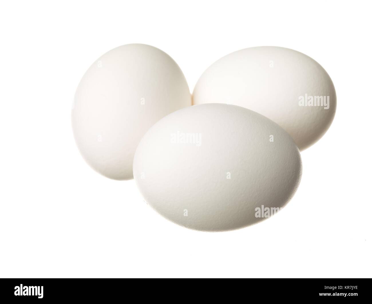 three eggs isolated on white Stock Photo - Alamy