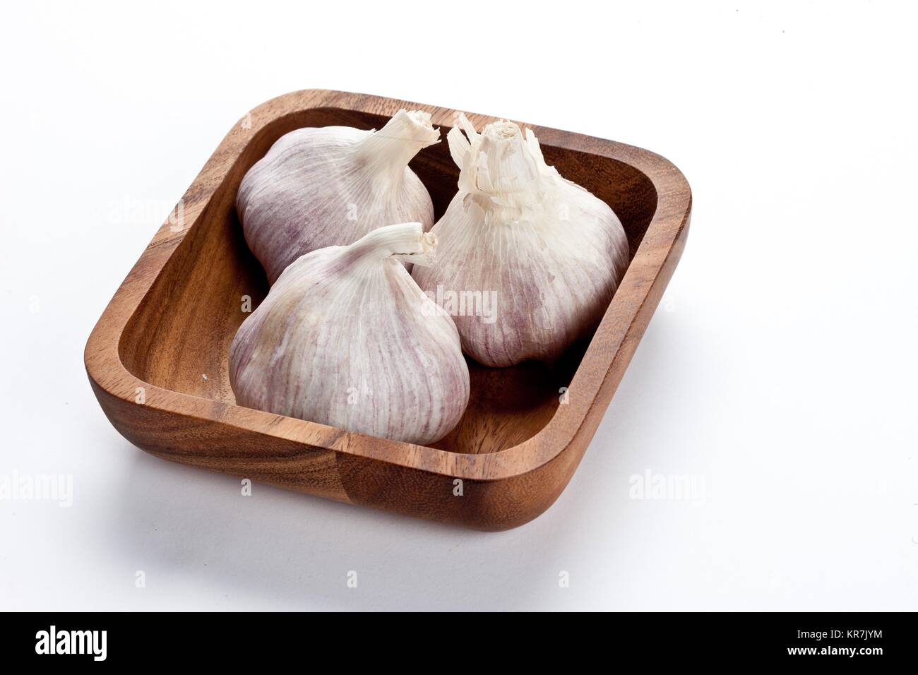 three garlic bulbs Stock Photo - Alamy
