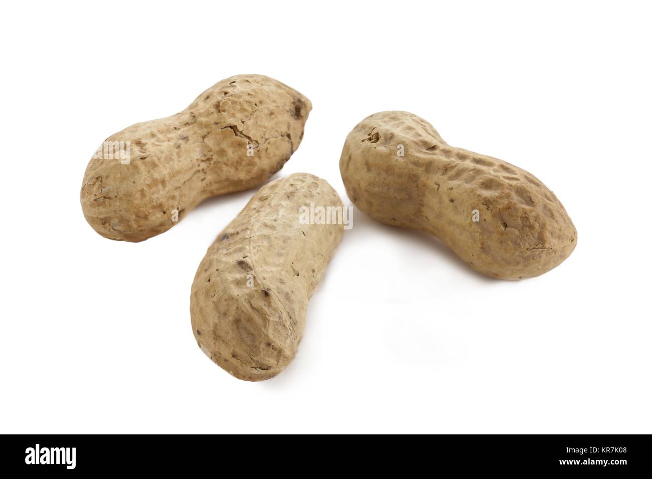 three pieces peanuts Stock Photo - Alamy