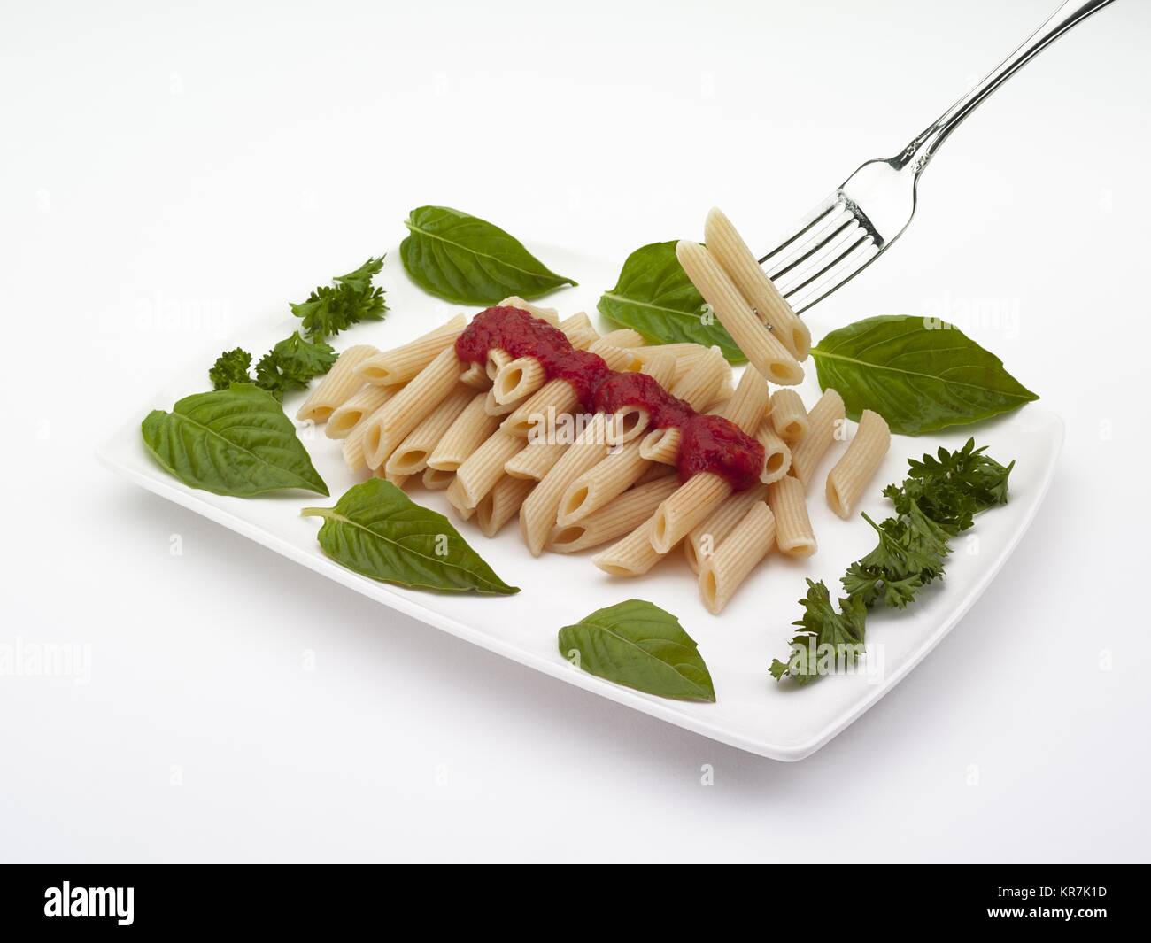 tidy plate of pasta Stock Photo - Alamy