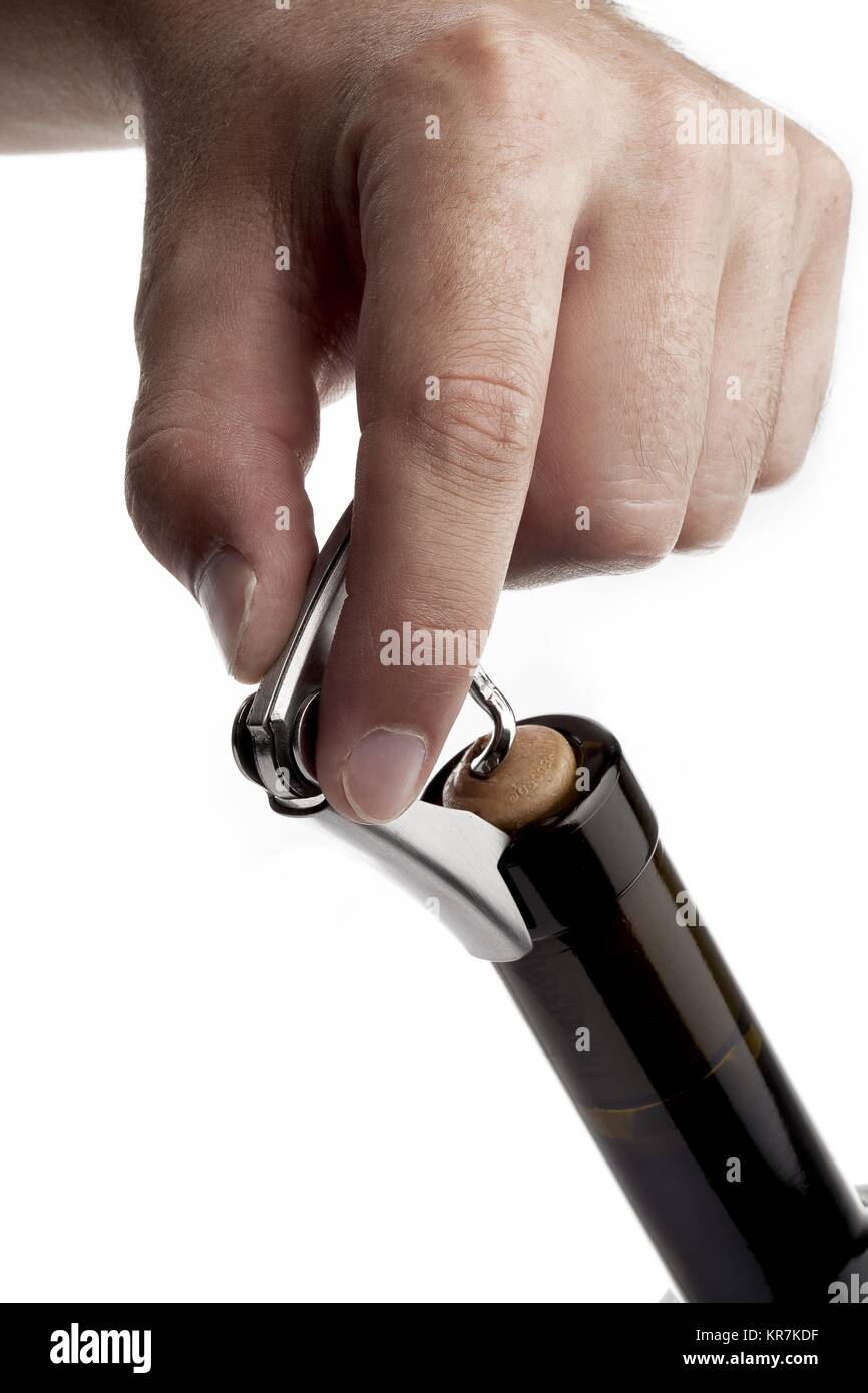 uncorking a wine bottle Stock Photo - Alamy