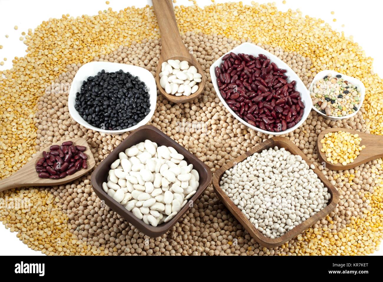 various food grains in wooden bowl and spatula Stock Photo - Alamy