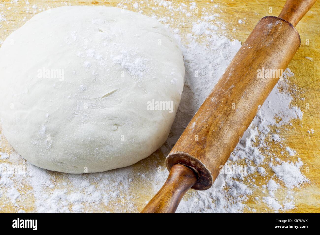 wooden rolling pin and dough Stock Photo - Alamy