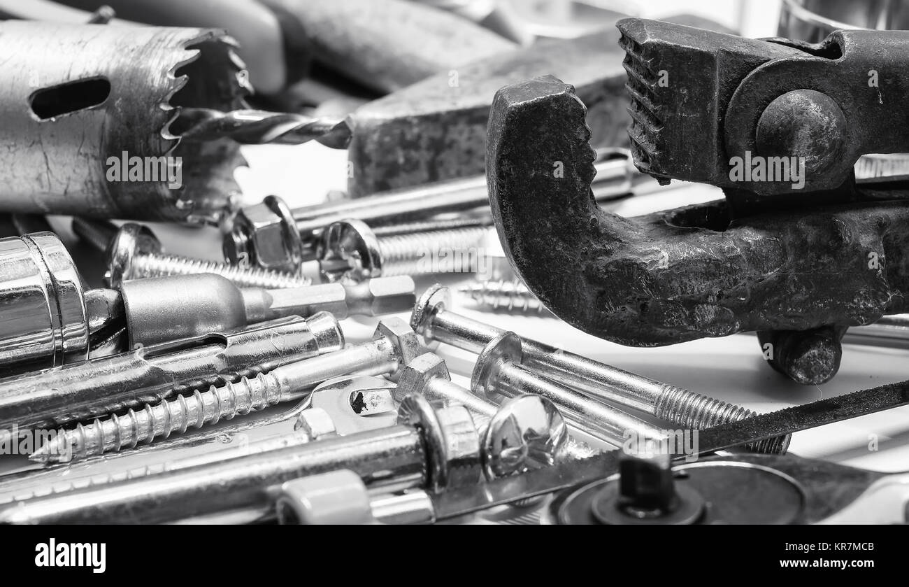 Working metal tools of silver color on the background Stock Photo - Alamy