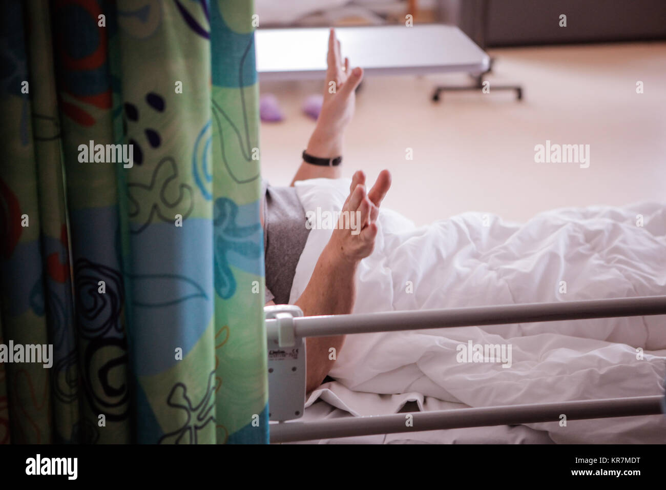Terminally ill patient sits in bed at a hospice Stock Photo - Alamy
