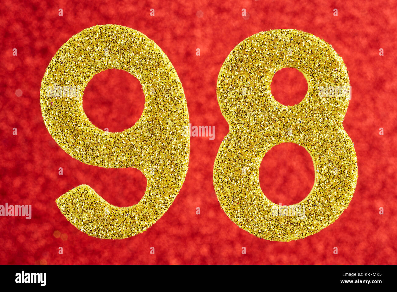 Number ninety-eight gold color over a red background. Anniversary ...