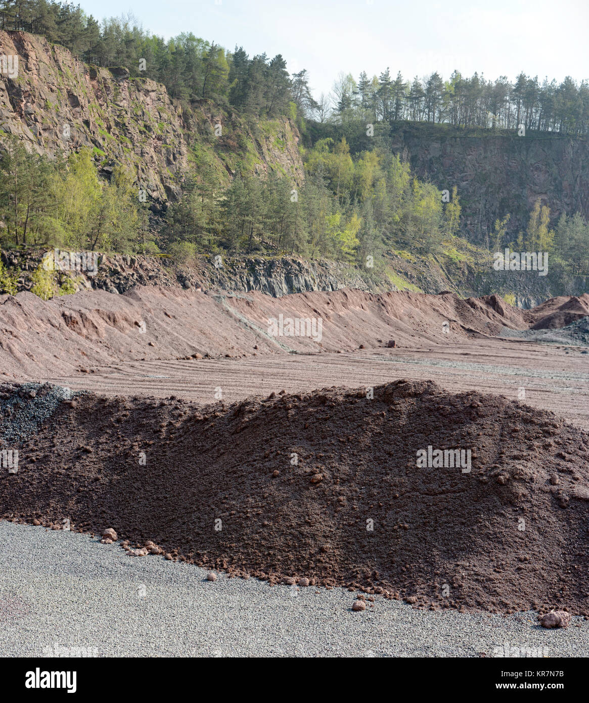 active quarry mine of porphyry rocks. digging. View into the pit Stock ...