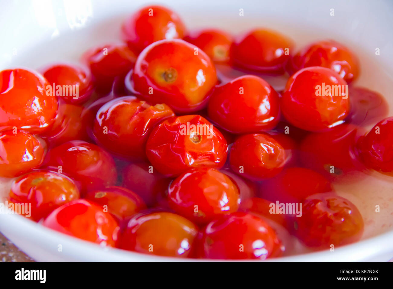 Photo of red tomato in brine with dill Stock Photo - Alamy