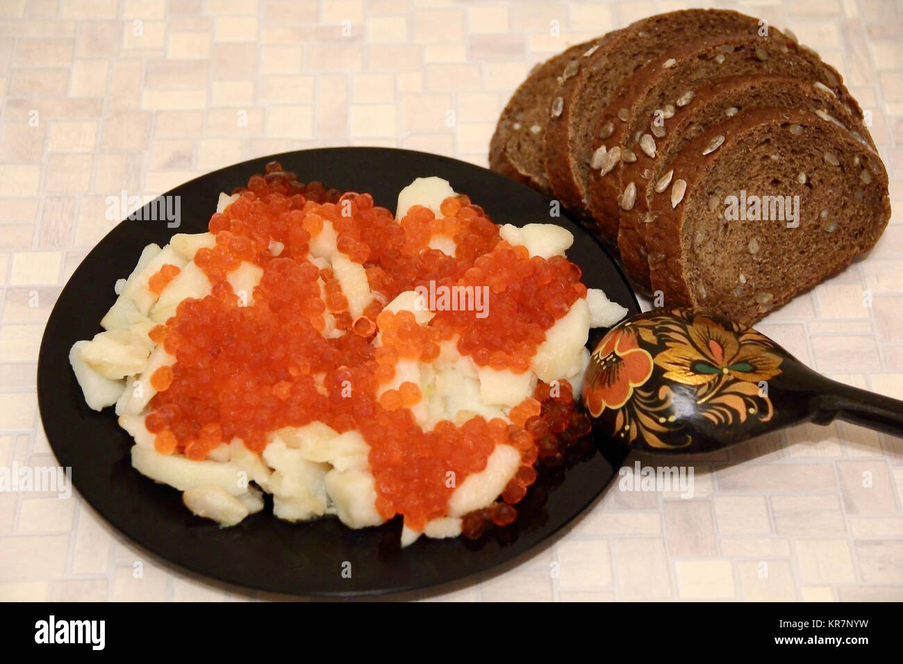Still life with Russian national food caviar and potatoes Stock Photo ...