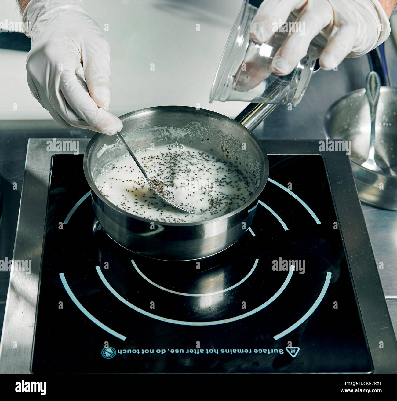 cooking ingredients in pan in the kitchen Stock Photo - Alamy
