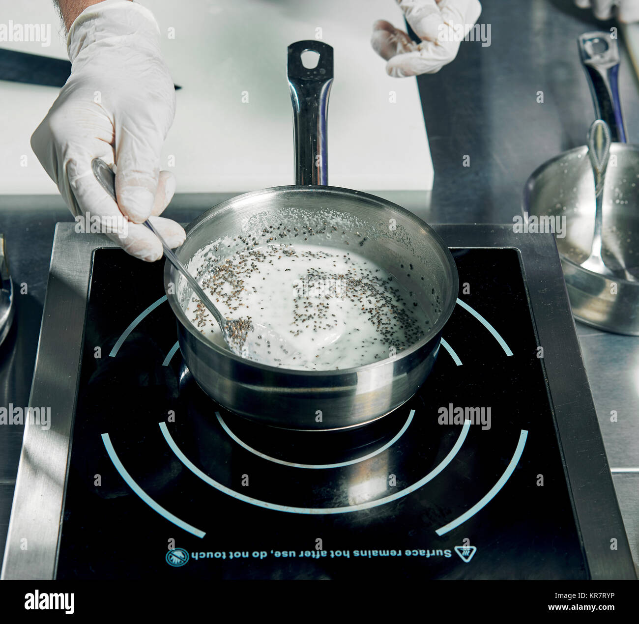 cooking ingredients in pan in the kitchen Stock Photo - Alamy