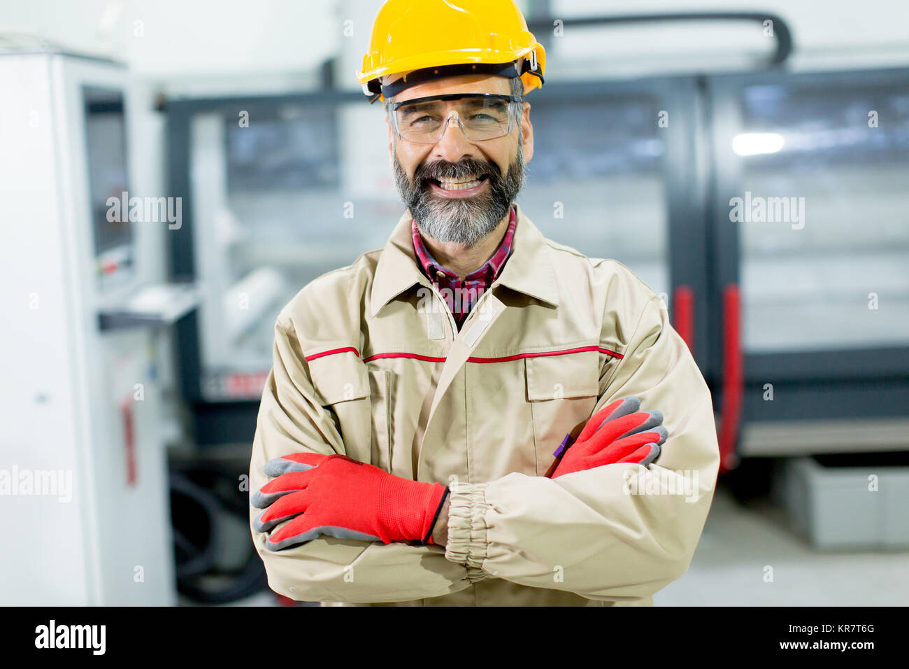 Portrait of middle-aged engineer in factory Stock Photo - Alamy