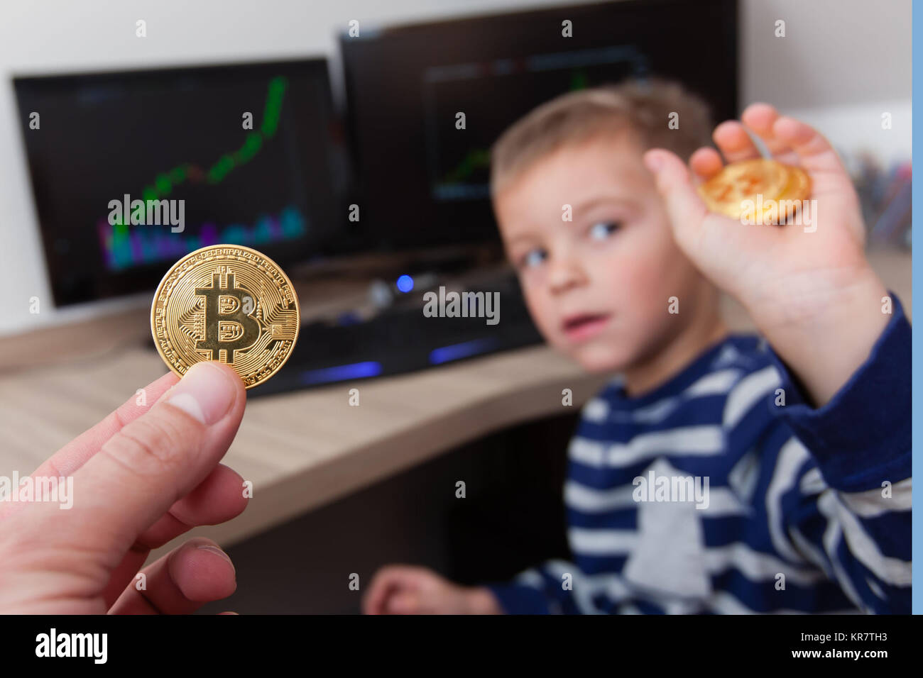 Child holding a coin hi-res stock photography and images - Alamy