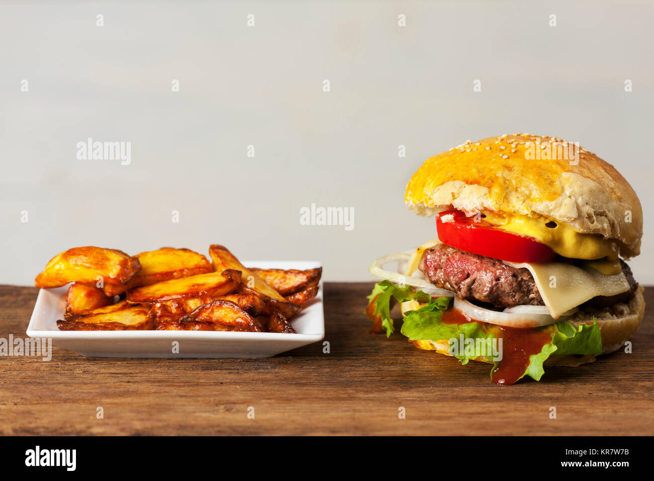 home made hamburger on rustic wood Stock Photo - Alamy