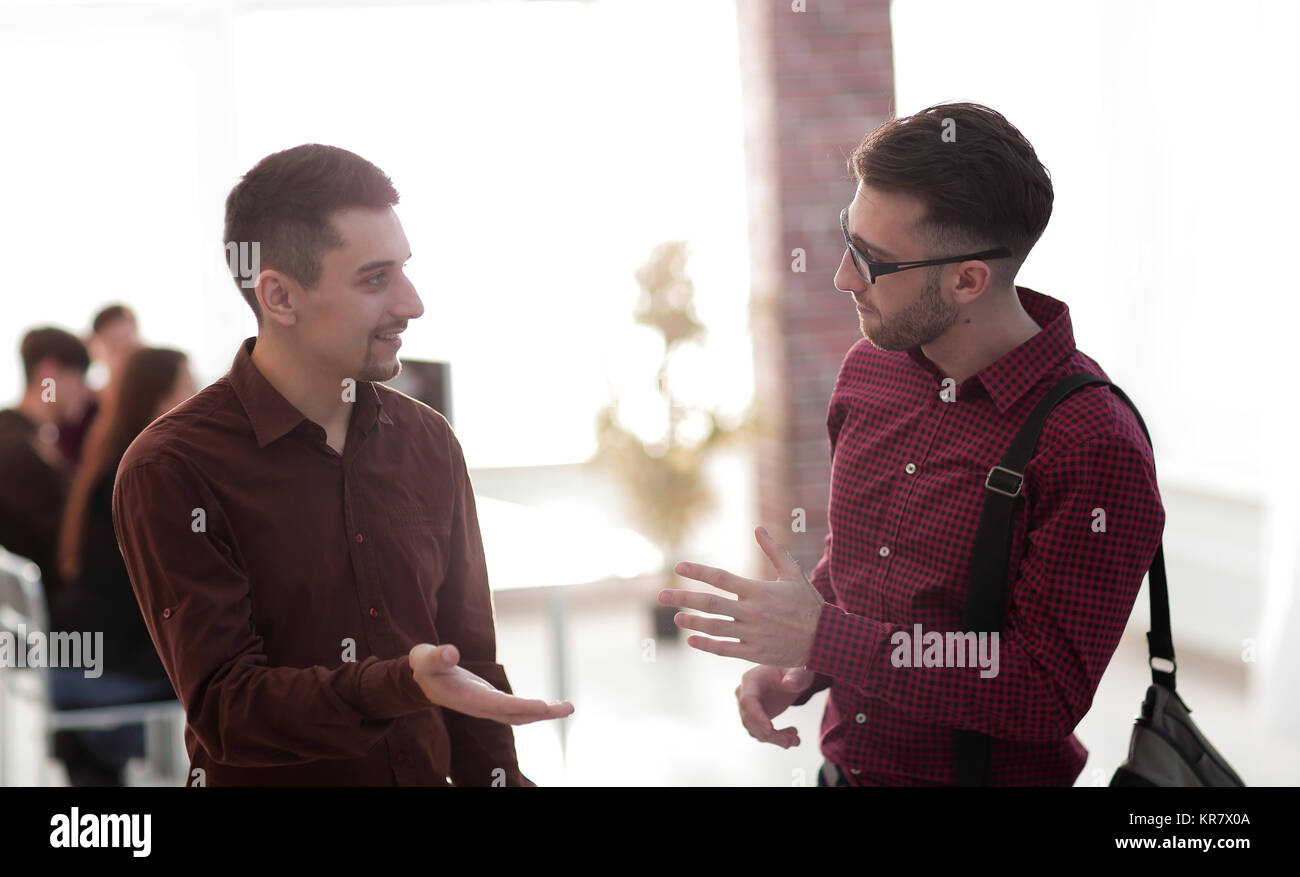 two colleagues talking in office Stock Photo - Alamy two colleagues talking in office Stock Photo - Alamy