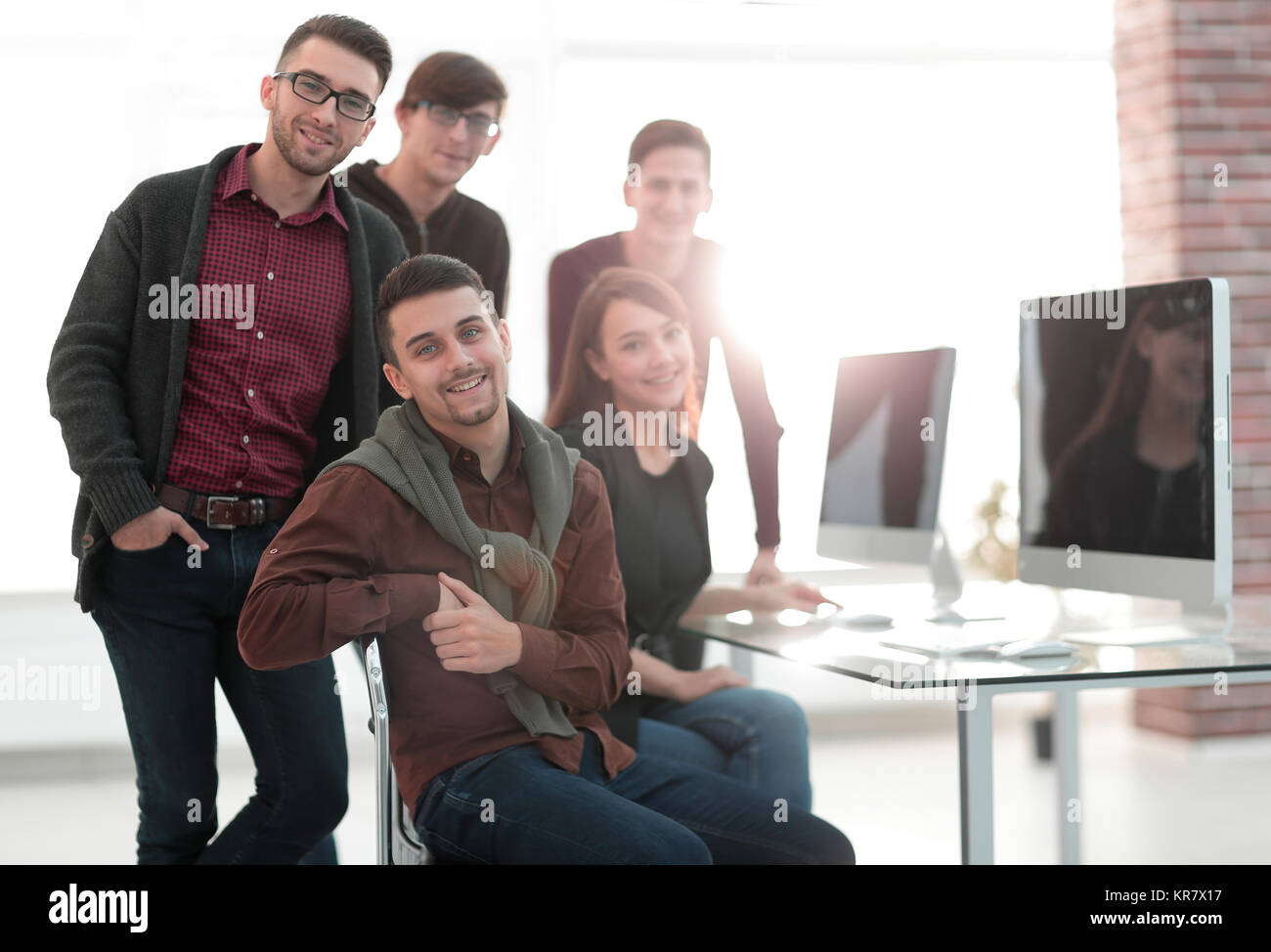 portrait of friendly business team in office Stock Photo - Alamy