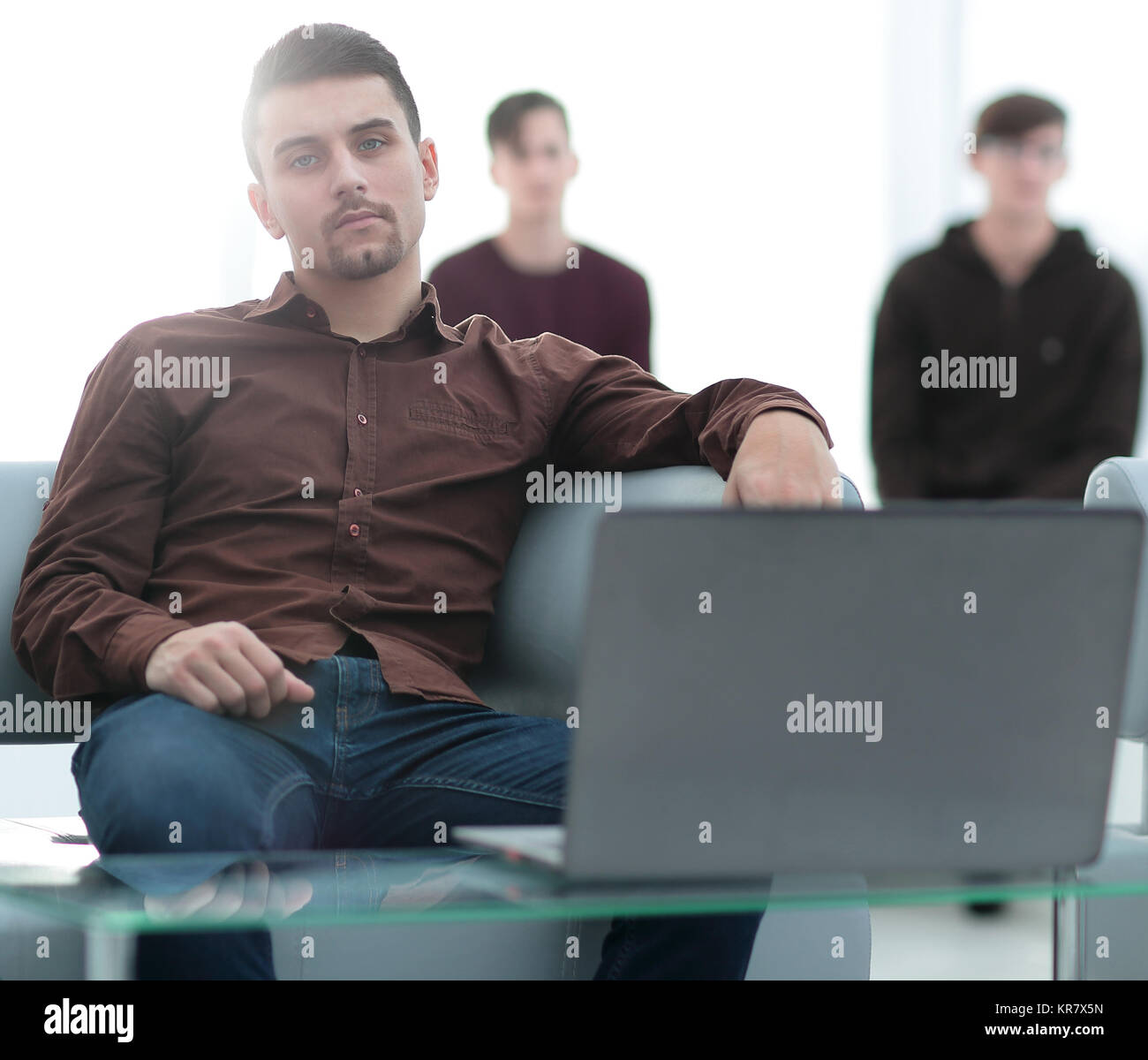 closeup.brooding guy with a laptop Stock Photo - Alamy