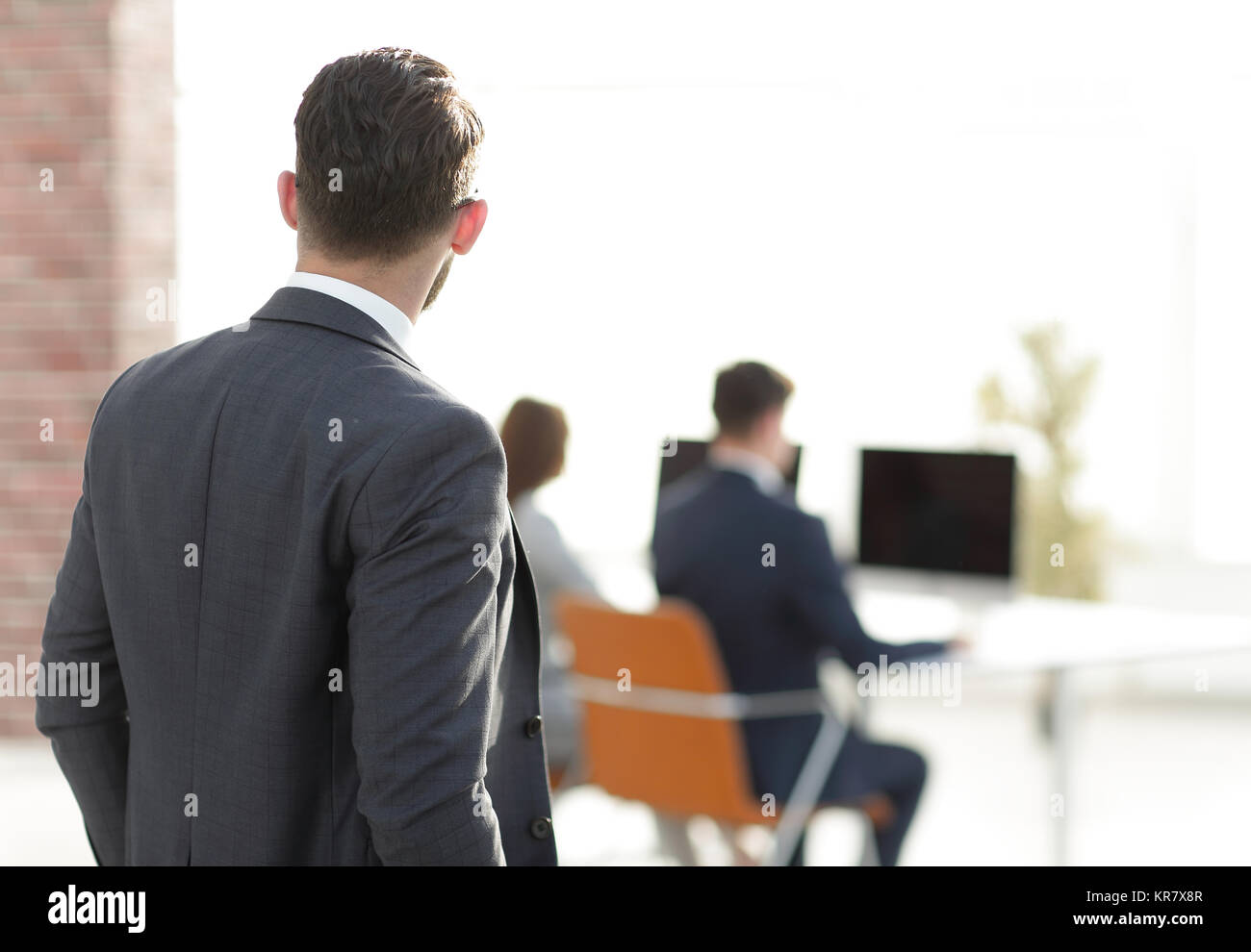 modern businessman standing in office Stock Photo - Alamy