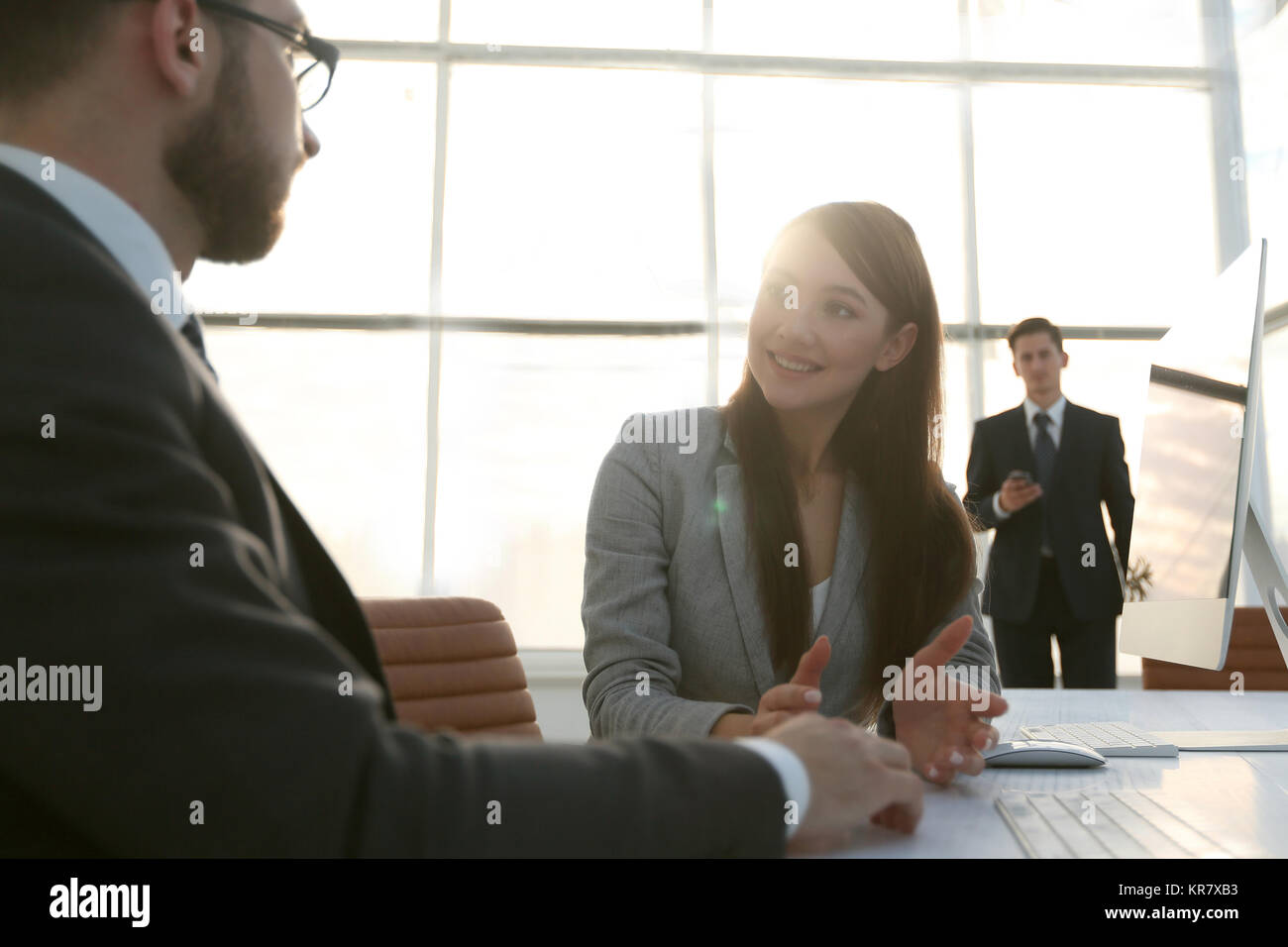 closeup.business partners discuss Stock Photo - Alamy