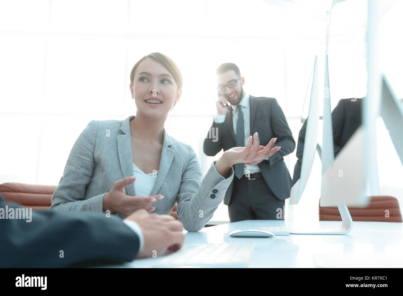 female consultant communicating with the client Stock Photo - Alamy