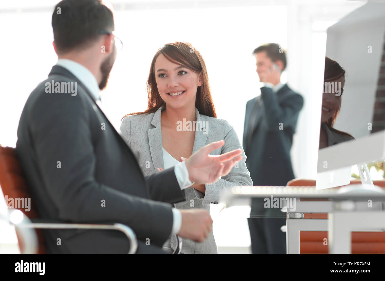 Manager and client talking in the office Stock Photo - Alamy