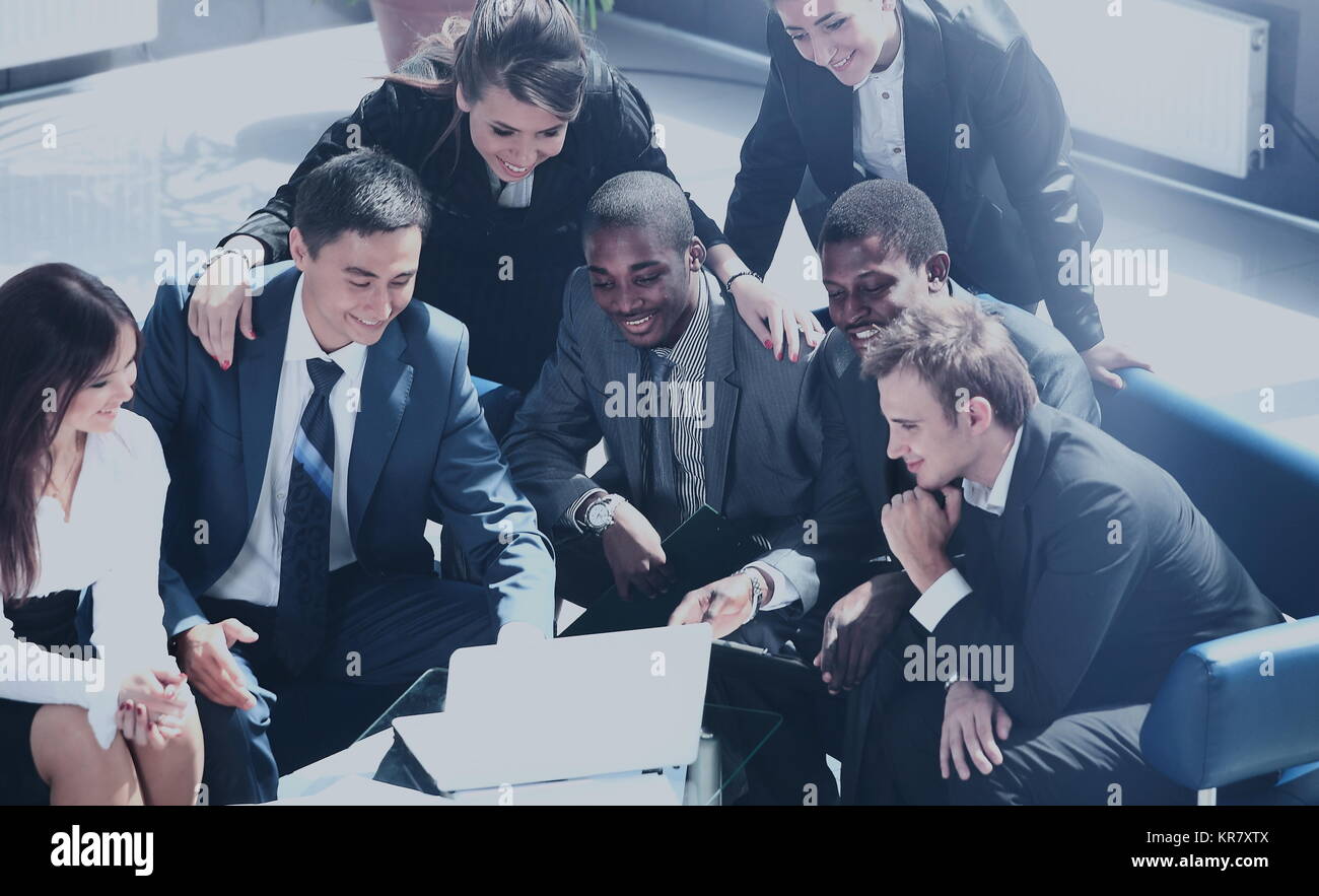 Happy working business team in modern office Stock Photo - Alamy