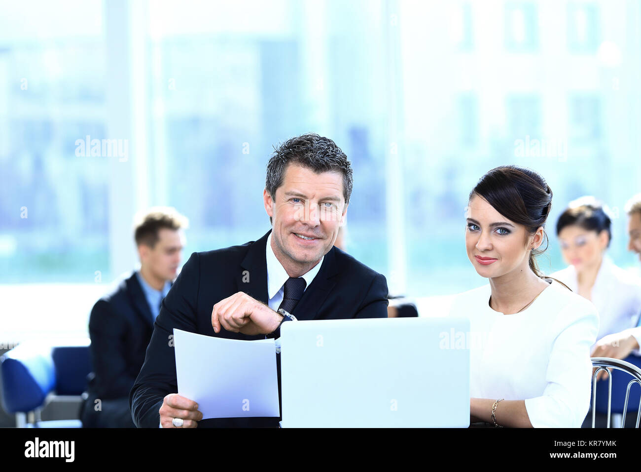 business partners working together in office Stock Photo - Alamy