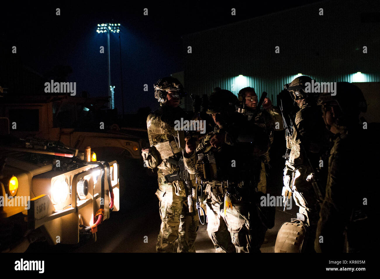 Members of the U.S. military and Clovis SWAT team get their gear ready ...