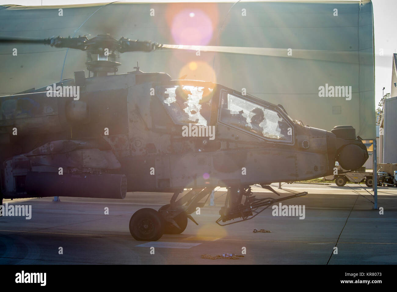 a U.S. Army National Guard AH-64D Apache Longbow helicopter with the ...