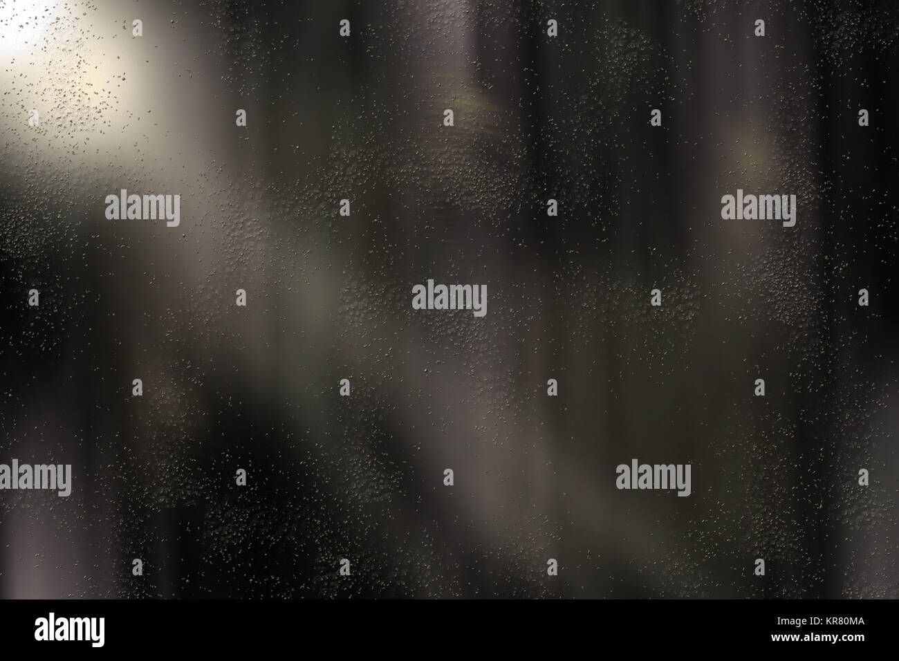 Diffused distorted grey glass effect background with lights shining ...