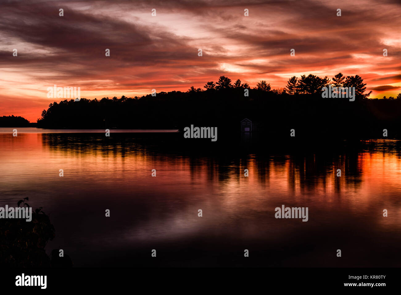Sunset on a Muskoka Dock Stock Photo - Alamy