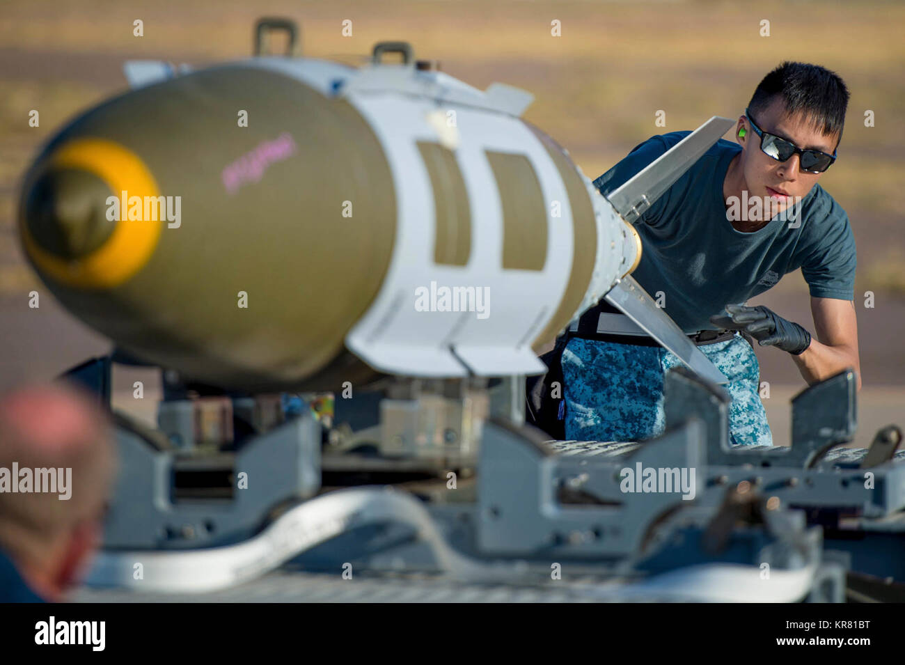 A Republic of Singapore Airman, assigned to the 428th Fighter Squadron ...