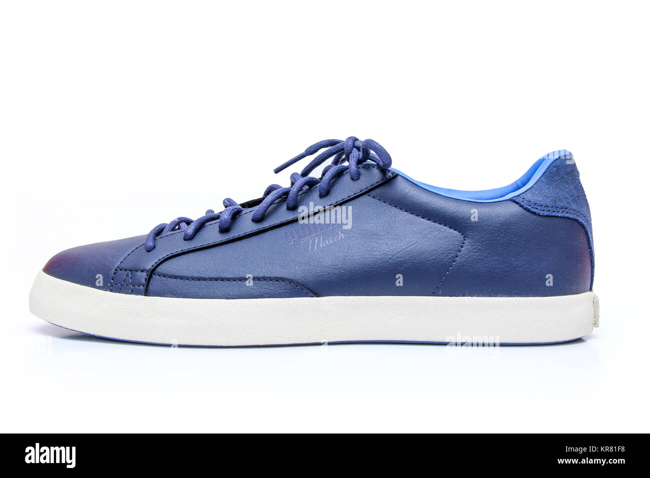 One Blue and White Unisex Shoe - Sneakers Stock Photo - Alamy