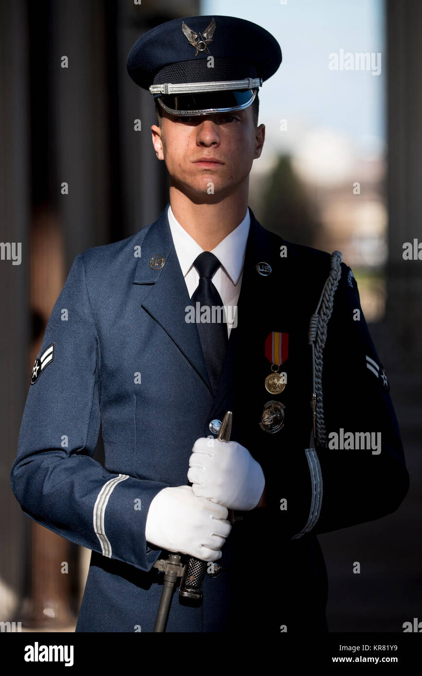 A U.S. Air Force member of an Armed Forces Honor Guard participates in ...