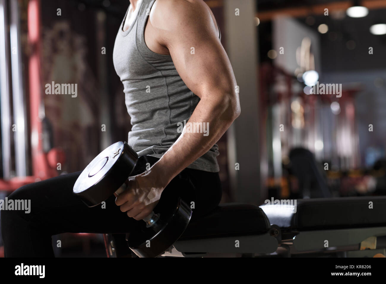 Young men exercise in the gym Stock Photo - Alamy