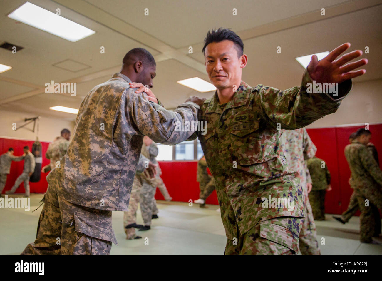 U.S. Army Spc. Javon Mackey, left, with 1st Battalion, 1st Air Defense ...