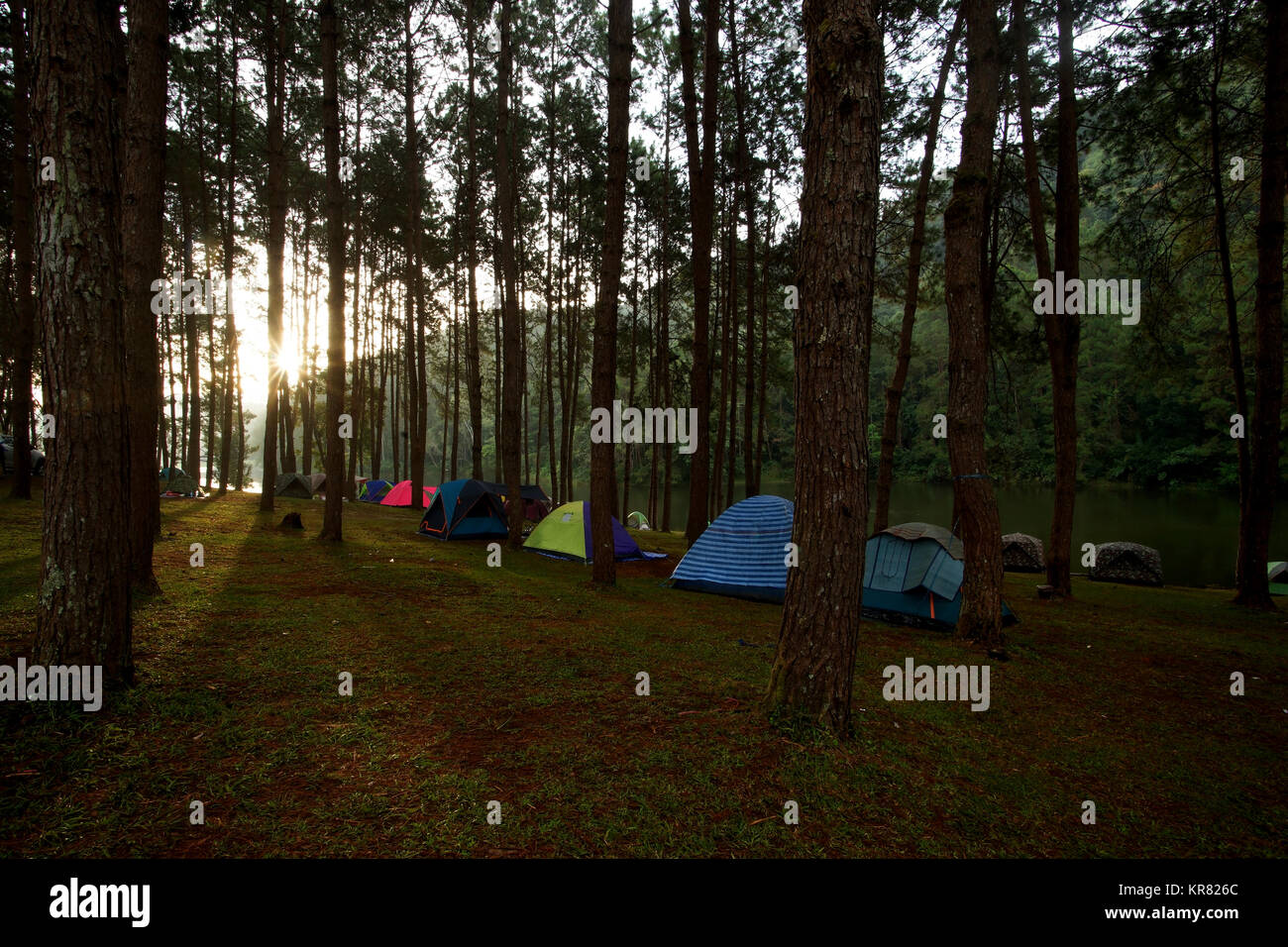 beautiful landscape, camping tents at outdoor camp site near the lake ...