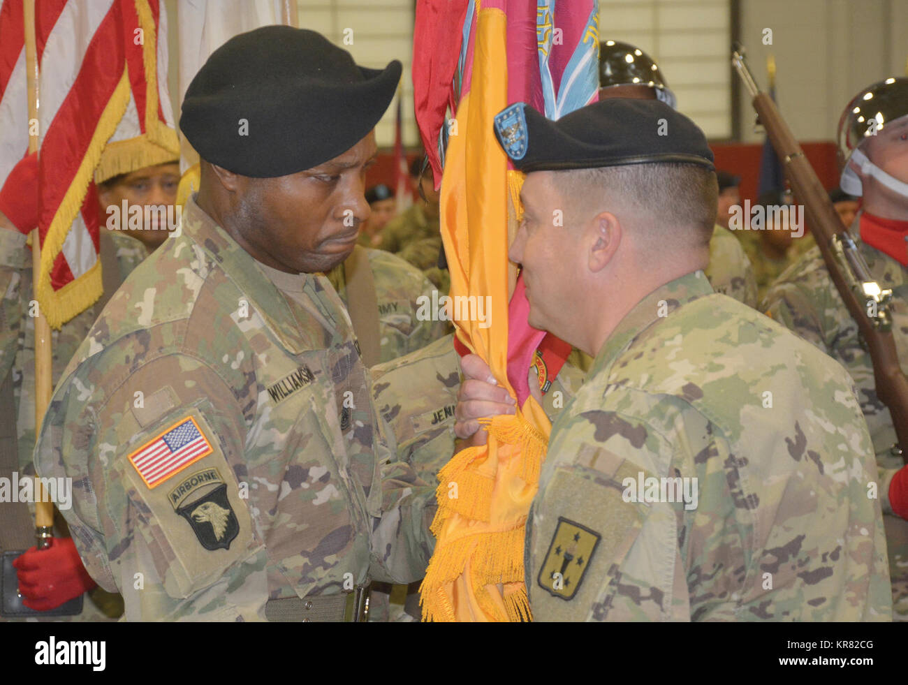 Command Sgt. Maj. Perry C. Williamson accepts the colors of the 59th ...