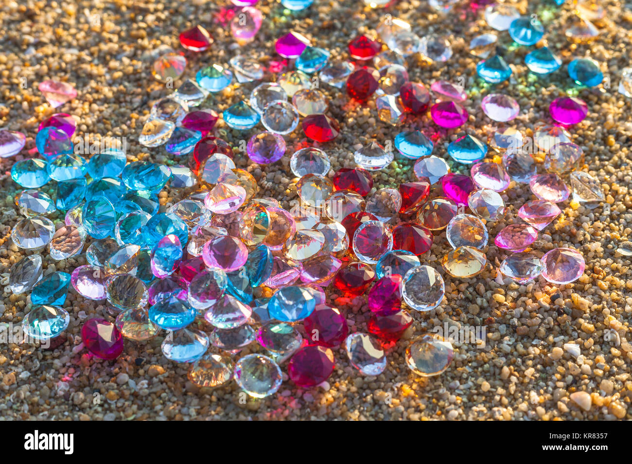sunshine on the beach in the morning light through gemstones are ...