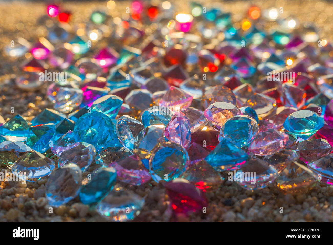 in the morning sunshine through on colorful gemstones. gemstones are ...