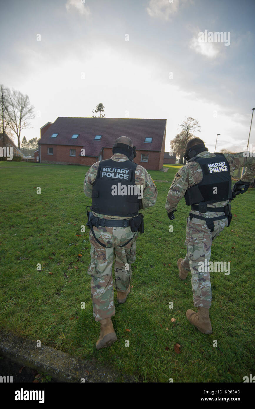 U.S. Soldiers assigned to the Provost Marshall Office at U.S. Army ...