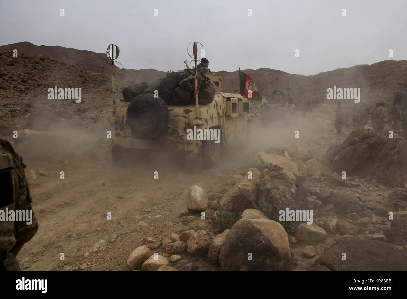 Afghan Commandos provide mounted security during a clearing operation ...
