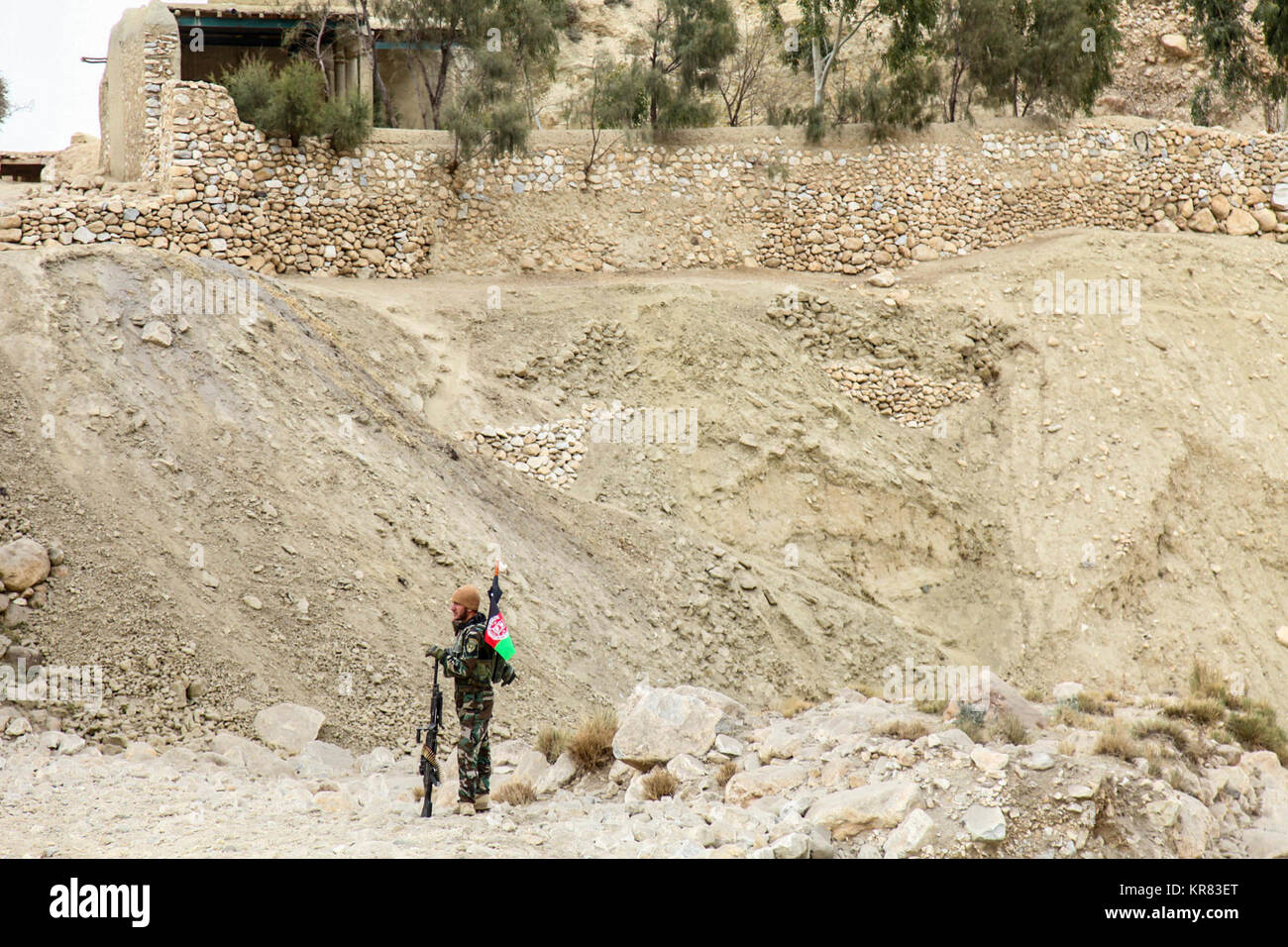 An Afghan 8th Special Operations Kandak Commando proudly displays the ...